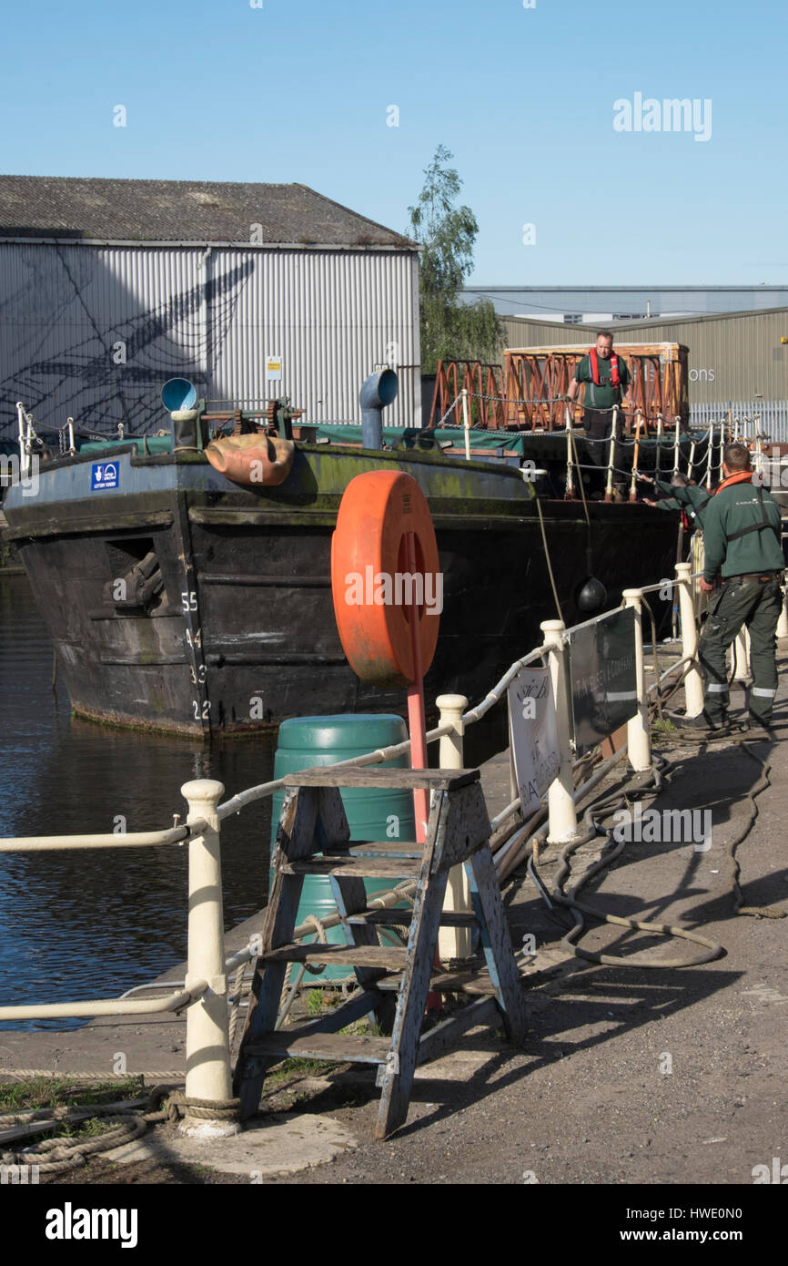 Barge Sabrina 5 being moved to dry dock for restoration and maintenance ...