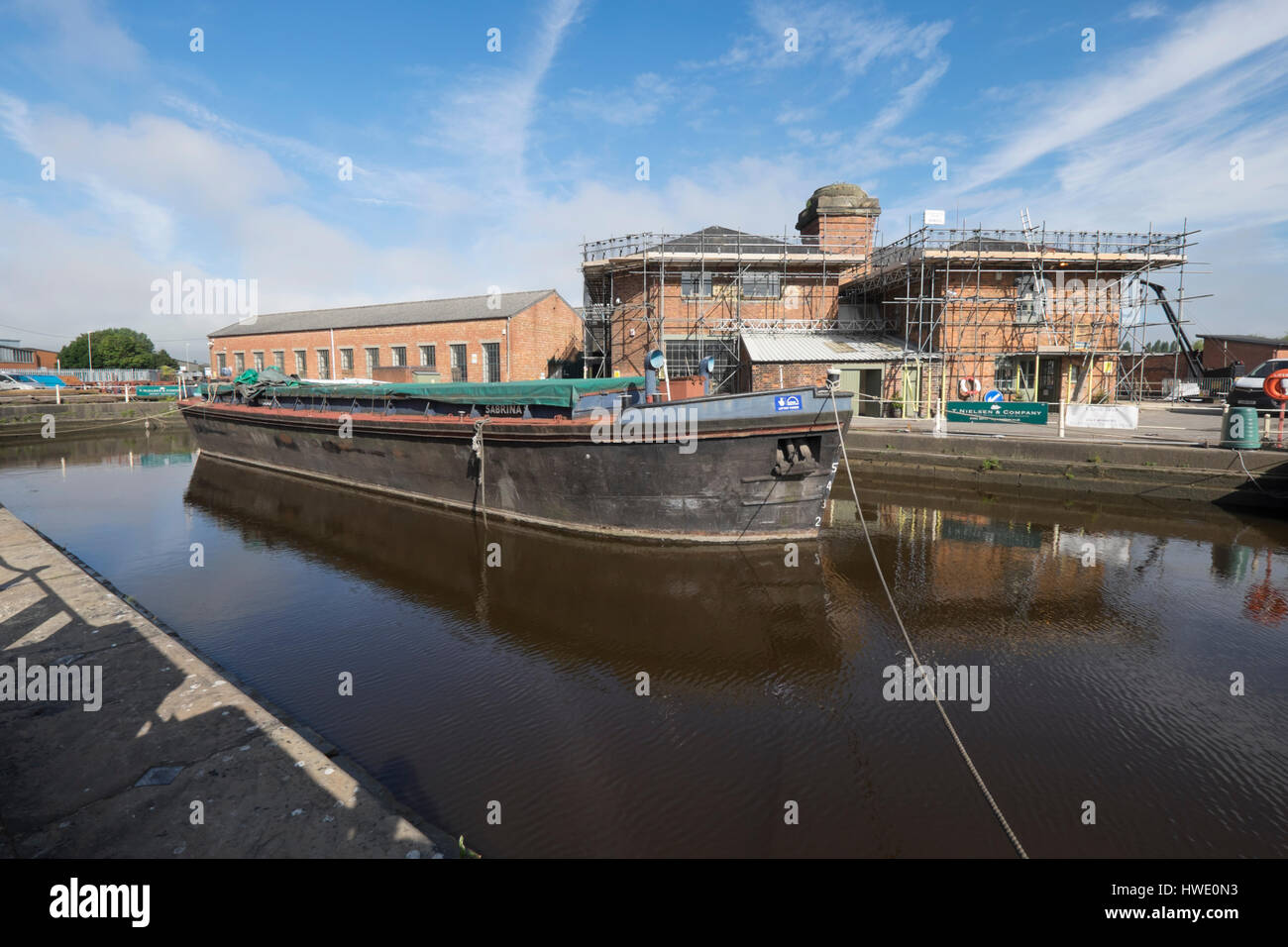 Barge Sabrina 5 being moved to dry dock for restoration and maintenance ...