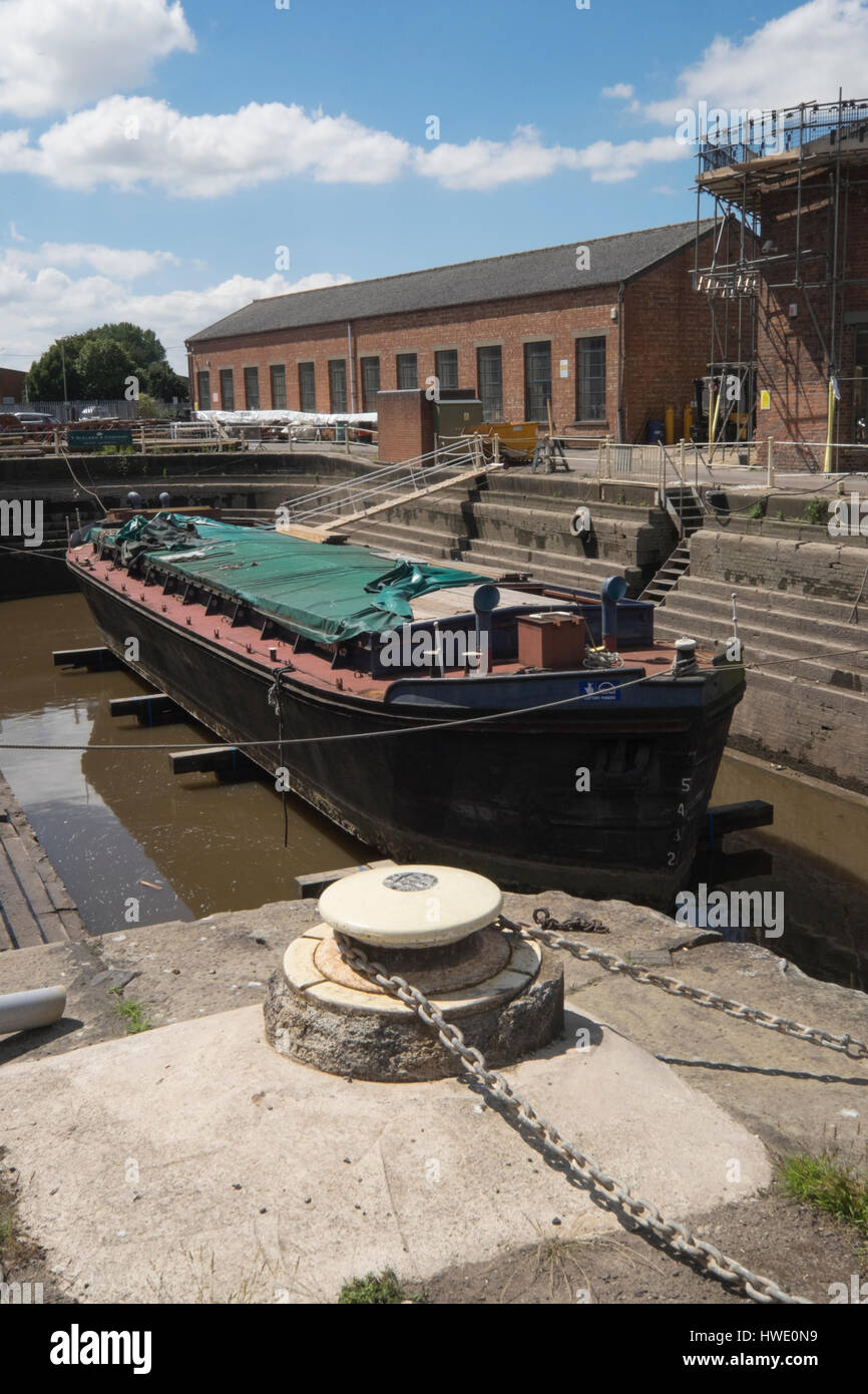 Barge Sabrina 5 being moved to dry dock for restoration and maintenance ...