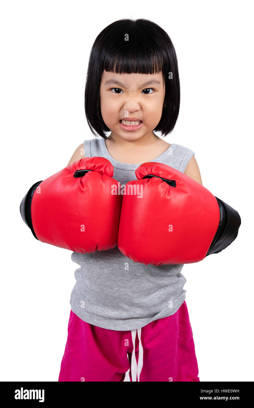 Asian Little Chinese Girl Wearing Boxing Glove With Fierce Expression ...
