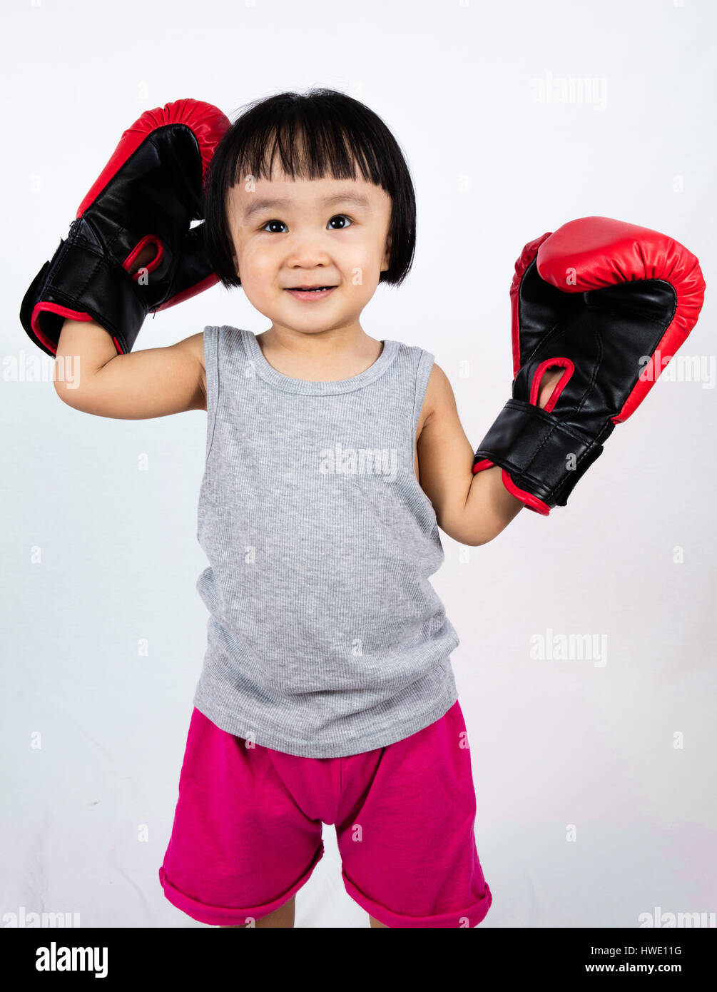 Child girl boxing gloves smile hi-res stock photography and images - Alamy