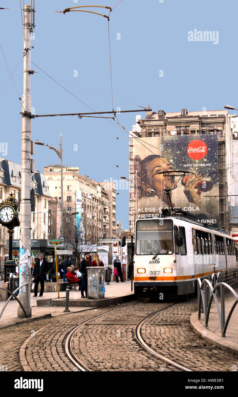 BUCHAREST, ROMANIA - 1 MARCH, 2017: Passengers join the tram at the ...