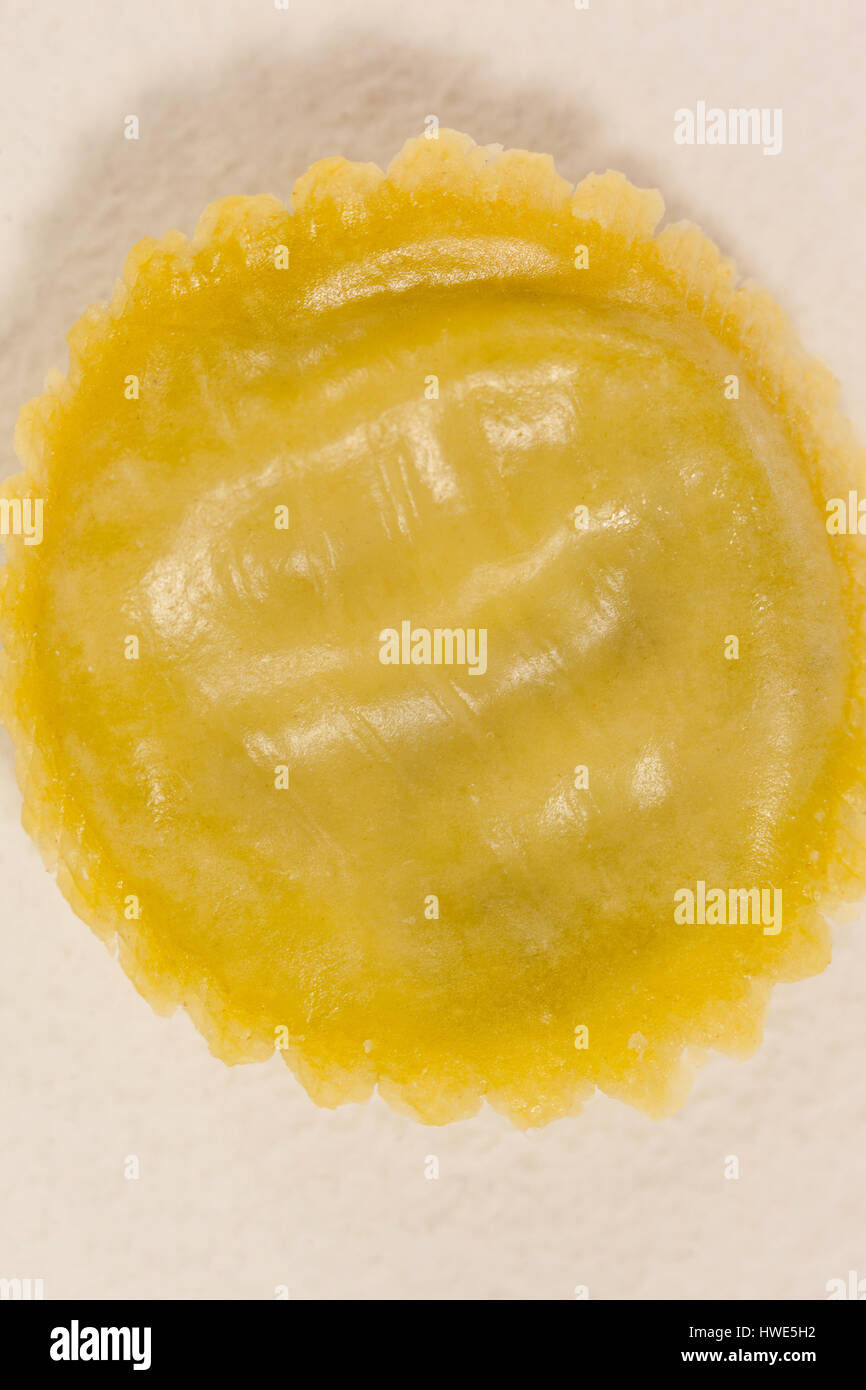 Circular ravioli pasta isolated on white background Stock Photo - Alamy
