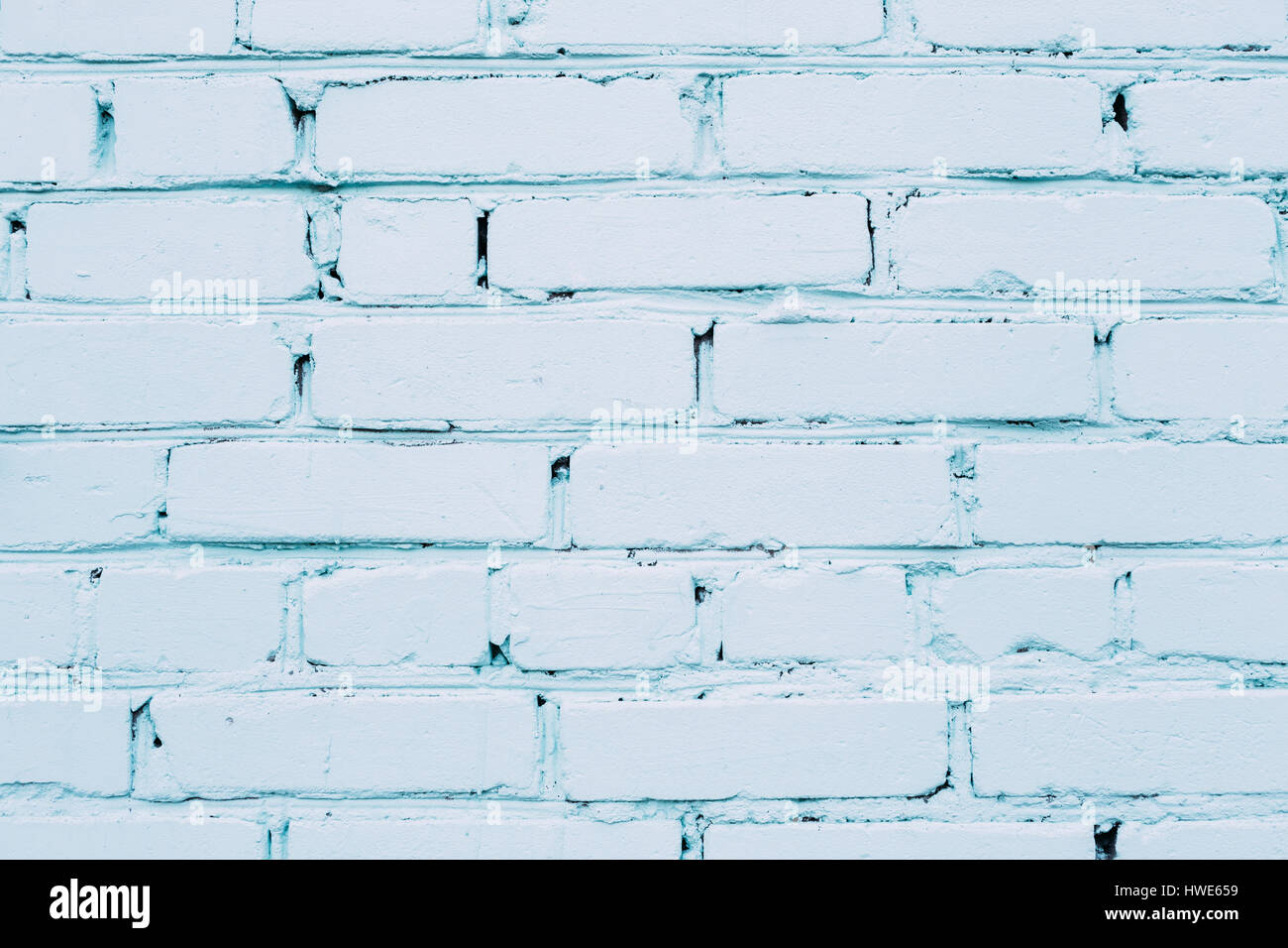 Blue cracked brick wall Stock Photo - Alamy