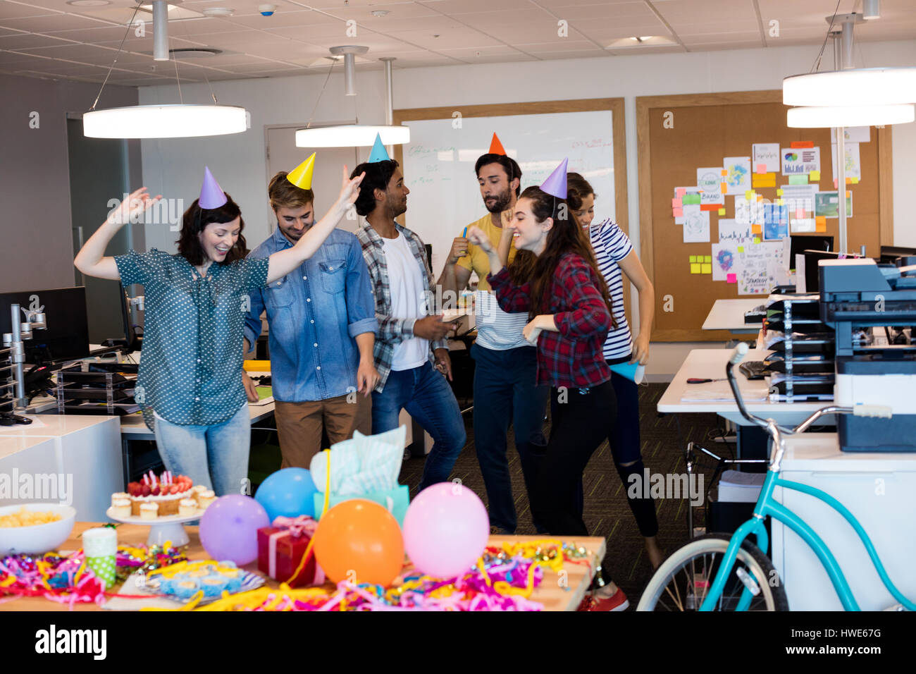 Creative business team dancing together at office Stock Photo - Alamy