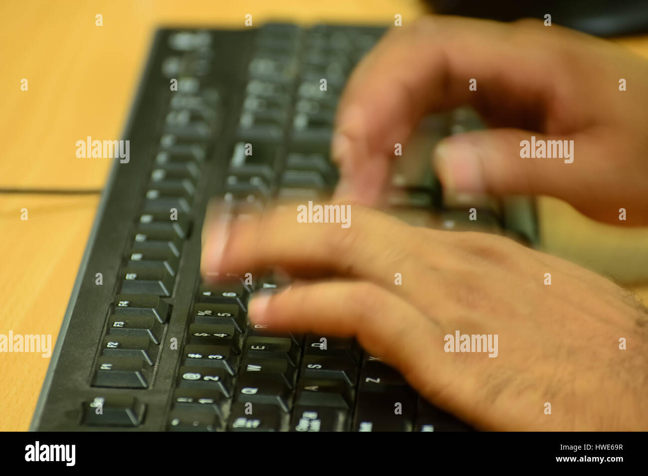 A boy typing keyboard Stock Photo - Alamy