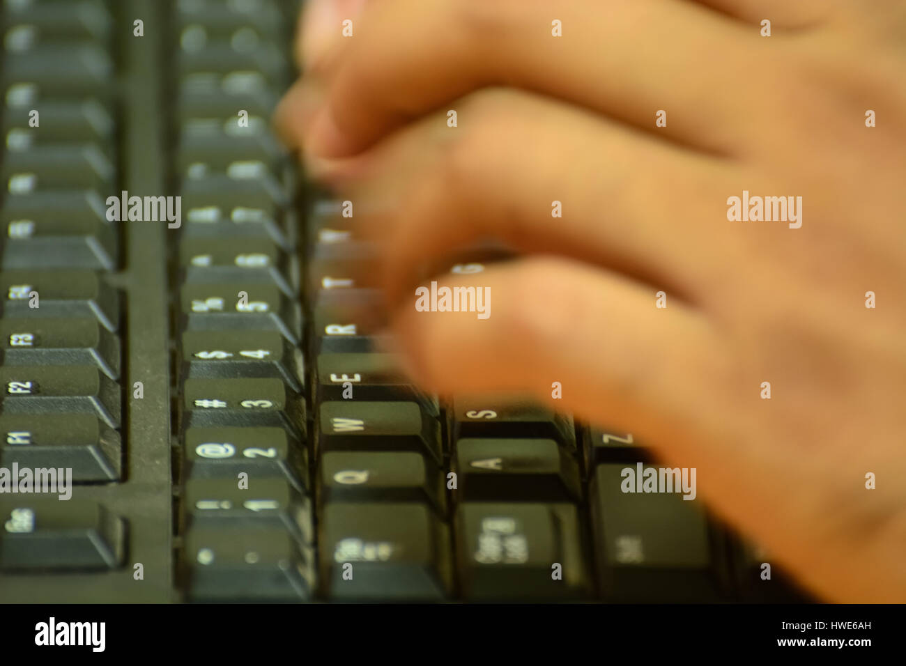 A boy typing keyboard Stock Photo - Alamy