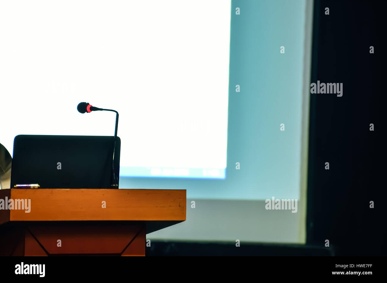 Empty podium in a lecture auditorium Stock Photo - Alamy
