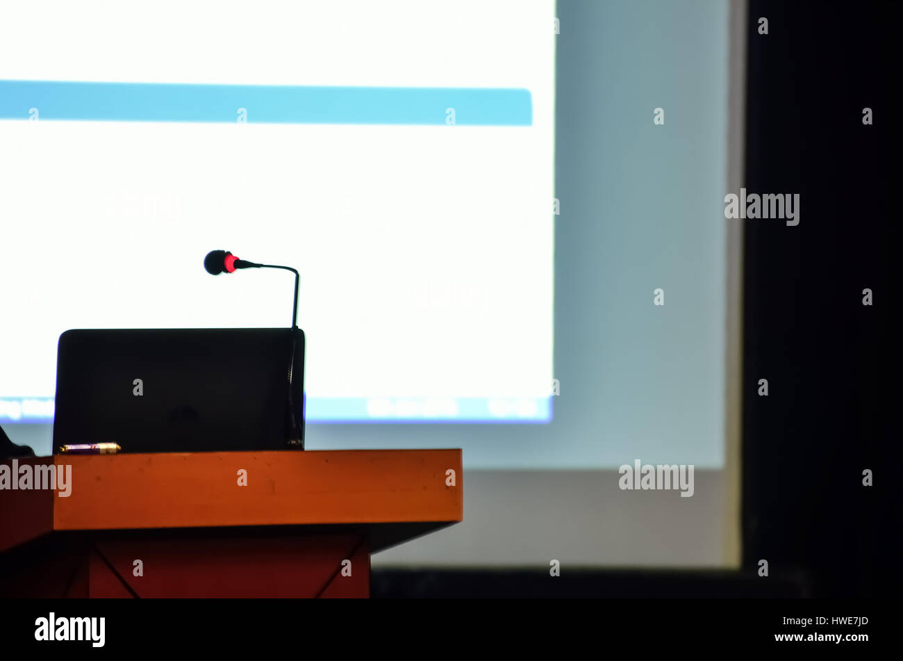 Empty podium in a lecture auditorium Stock Photo - Alamy