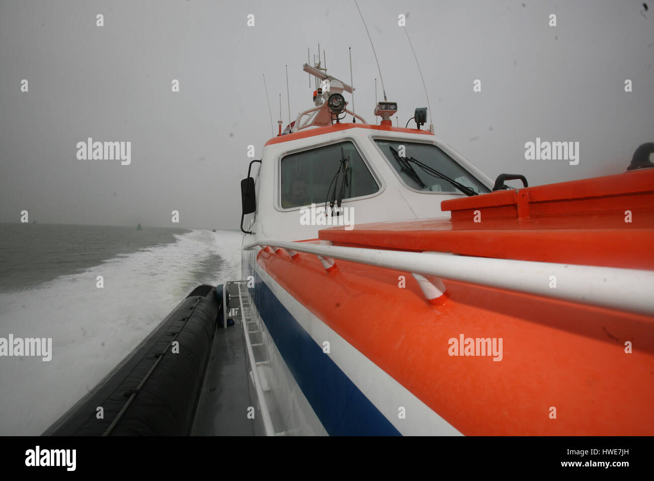 rescue operation by a lifeboat at the northsea Stock Photo - Alamy