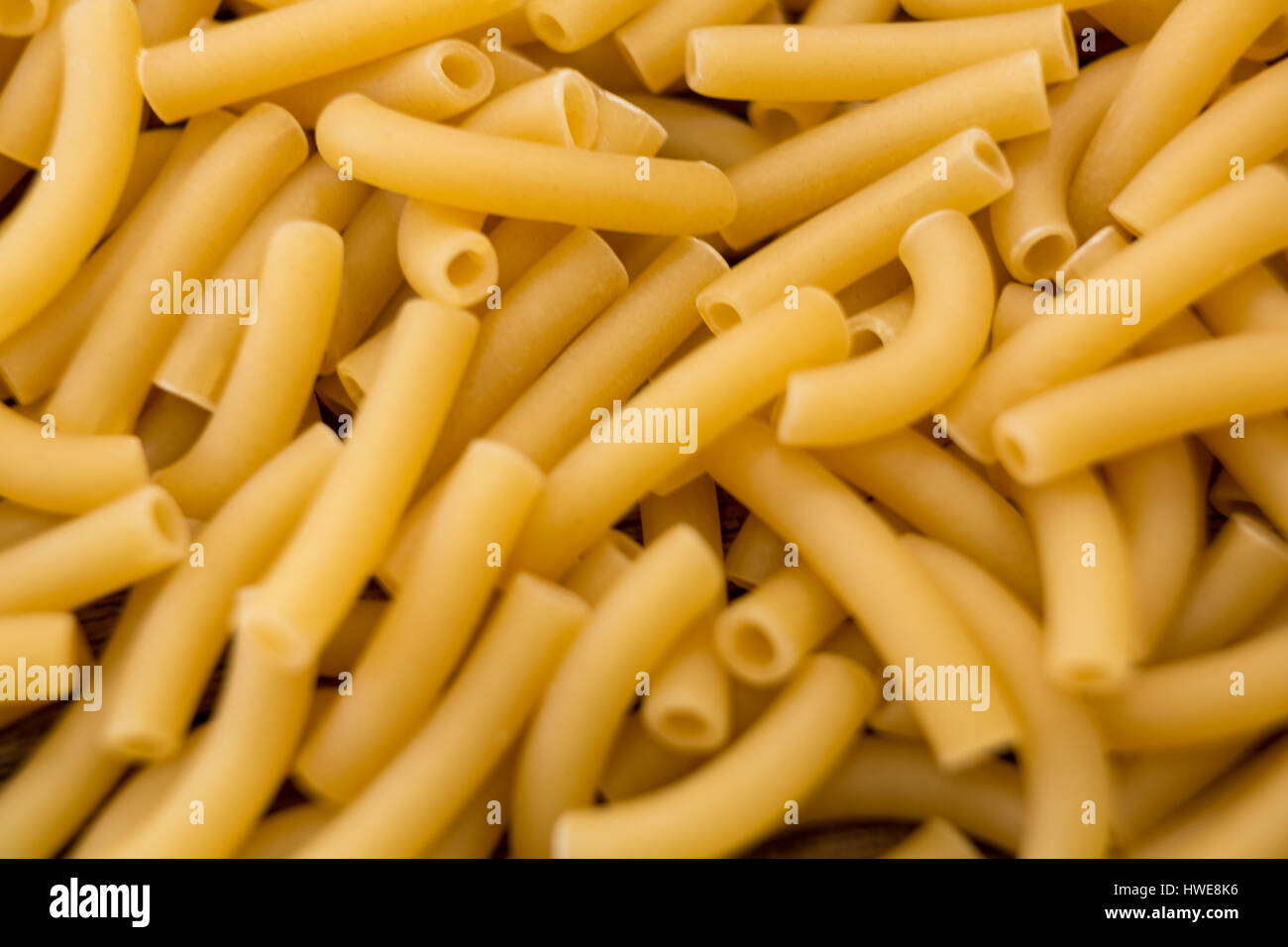 Full frame of raw macaroni Stock Photo - Alamy