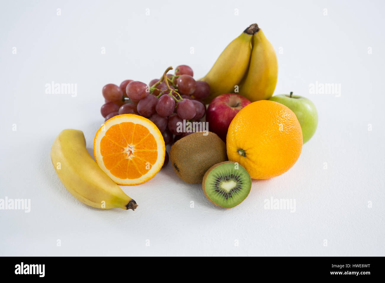 Close-up of various types of fruits on white background Stock Photo - Alamy