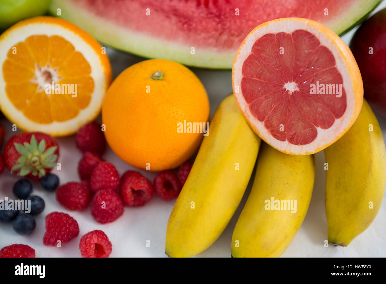 Close-up of various types of fruits on white background Stock Photo - Alamy