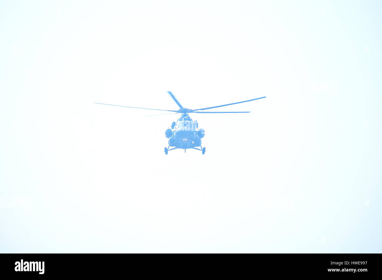 Photograph of a helicopter capture from below of it Stock Photo - Alamy
