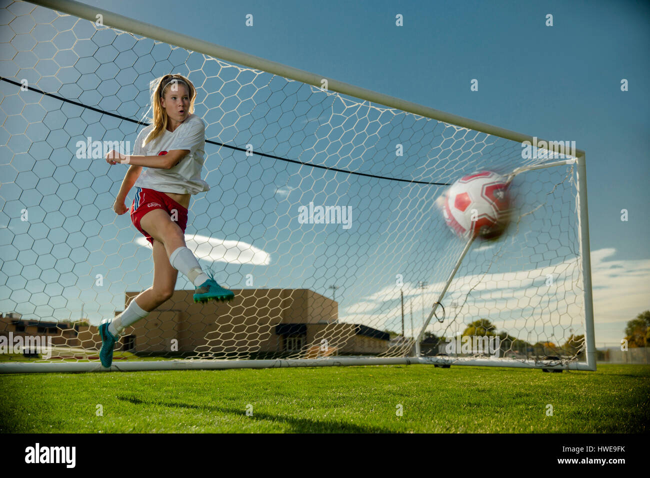 Goalie jumping ball hi-res stock photography and images - Alamy
