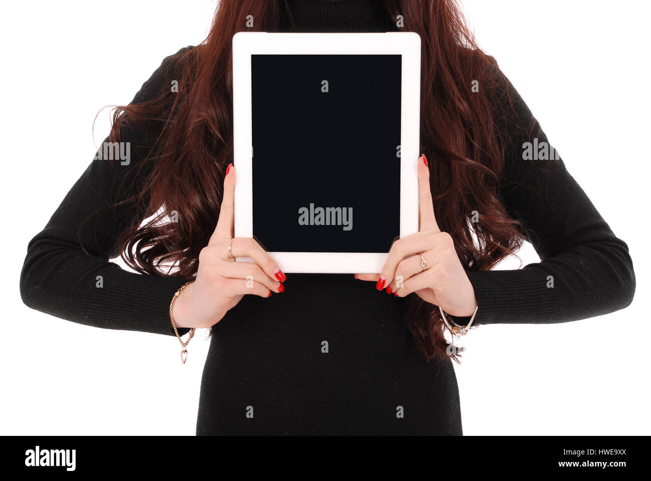 Teenage girl showing a blank vertical tablet screen isolated on white ...