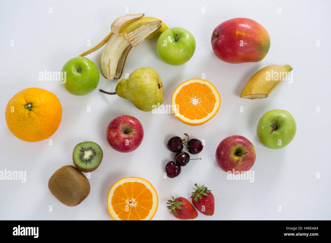 Close-up of various types of fruits on white background Stock Photo - Alamy