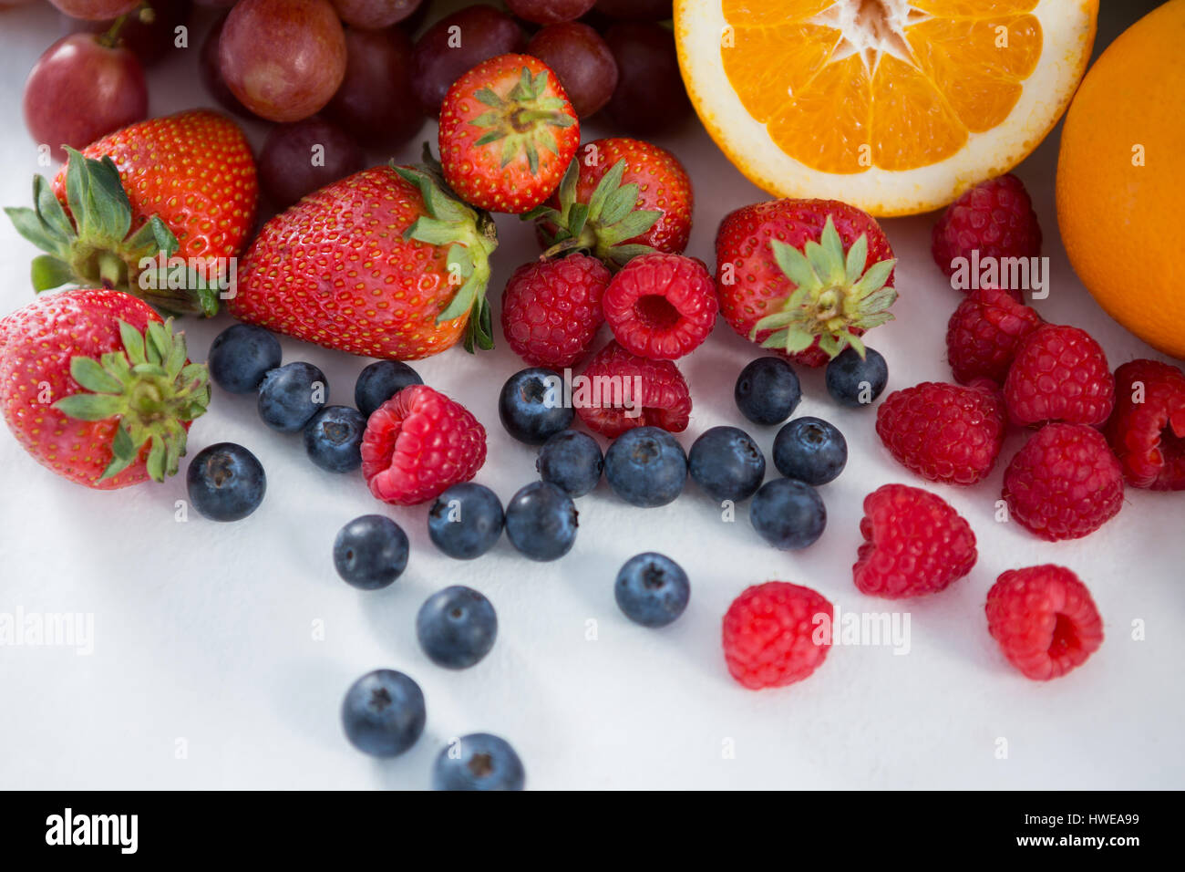 Close-up of various types of fruits on white background Stock Photo - Alamy