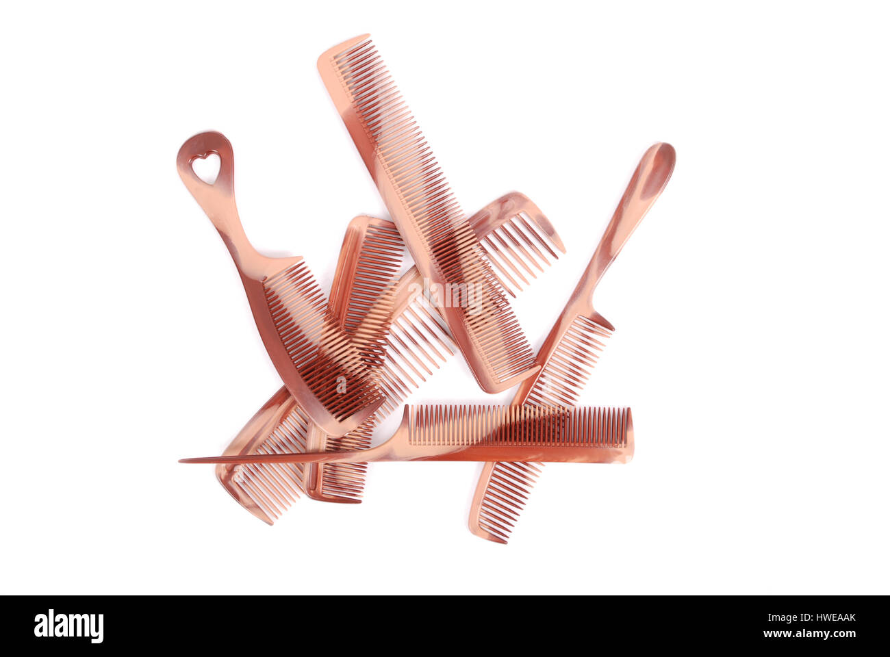 Set of brown plastic comb isolated on white background Stock Photo - Alamy