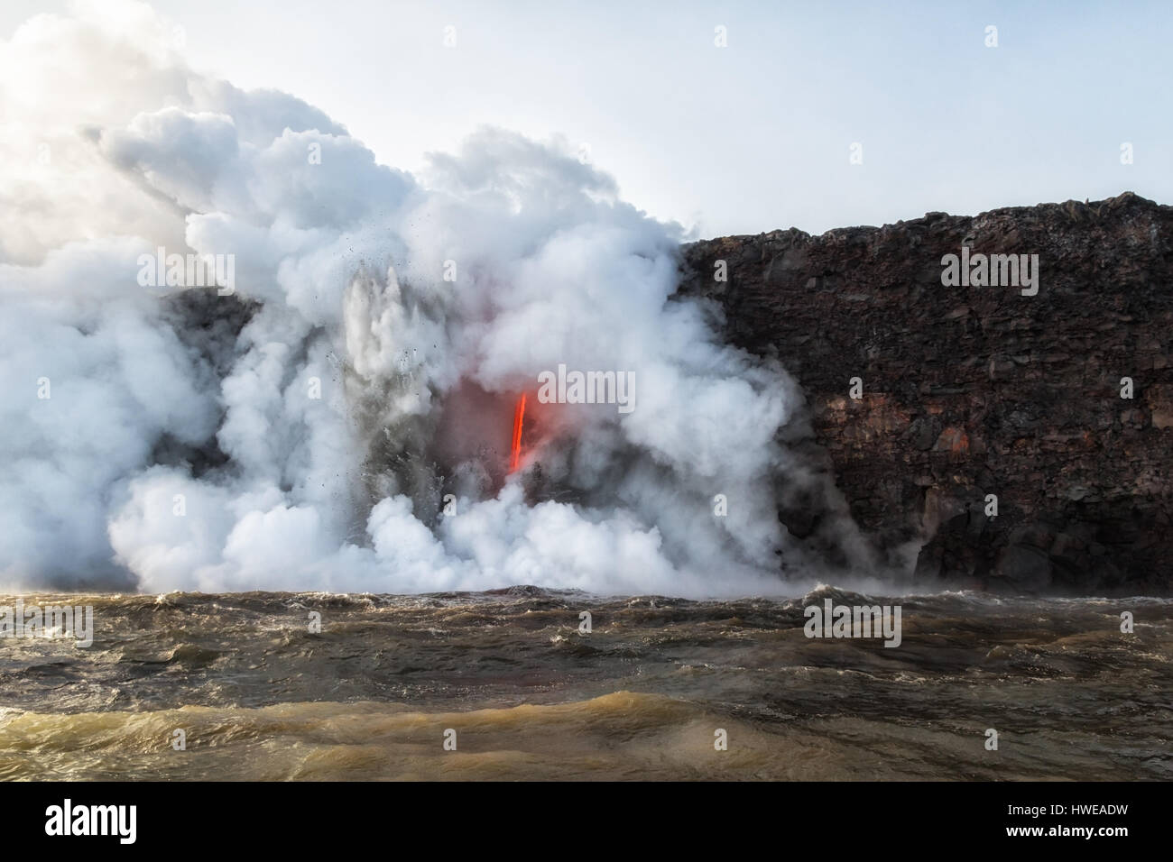 Steam plumes at the Kamokuna lava entry into the Pacific Ocean from the ...