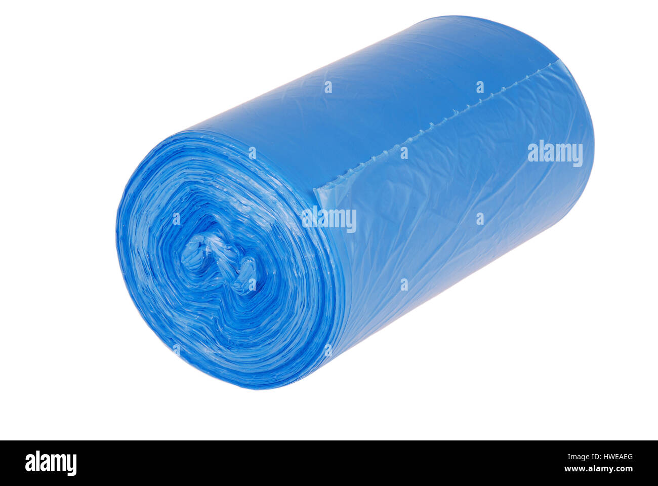 Roll of blue plastic garbage bags isolated on white background ...
