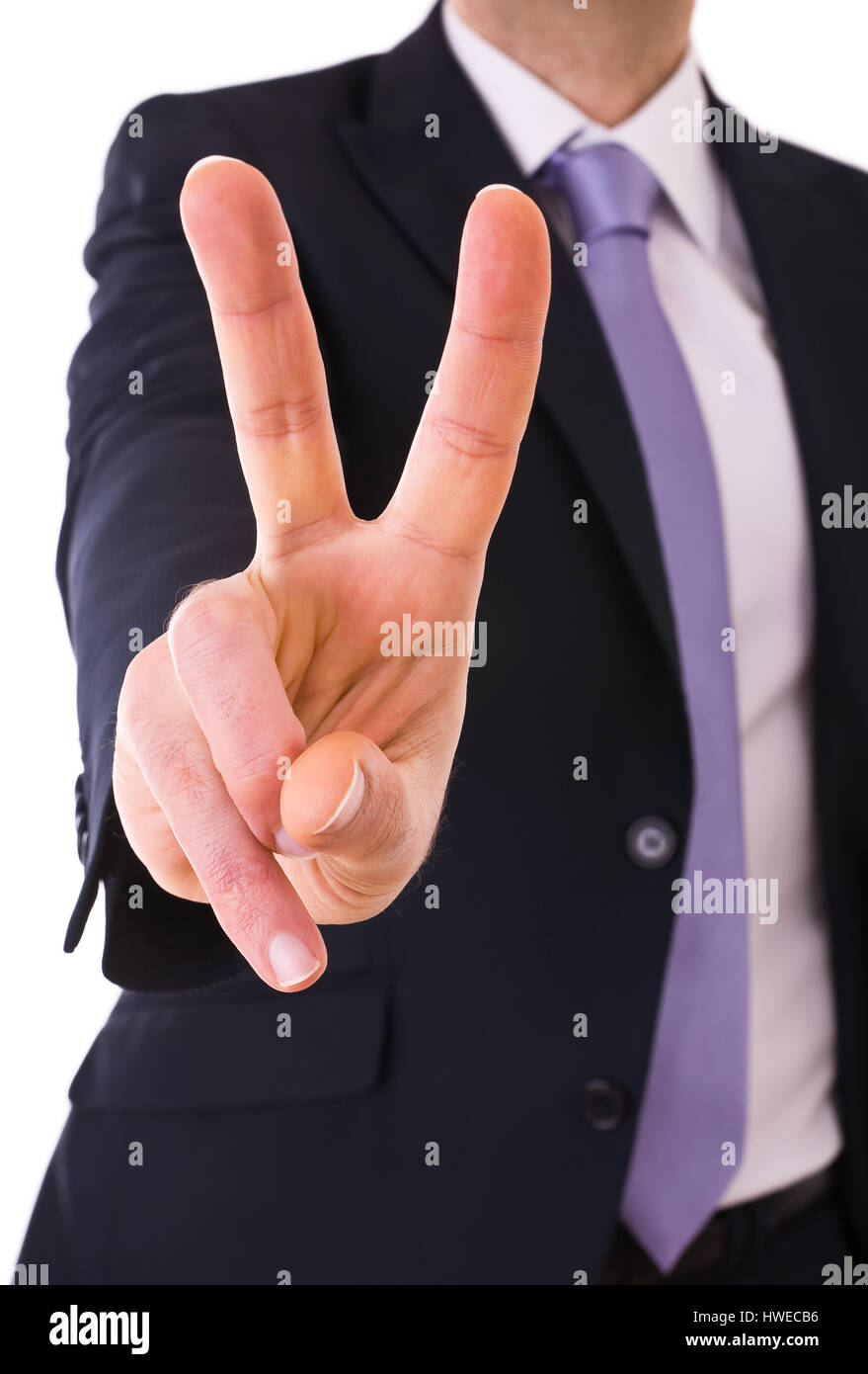 Business man showing Victory sign Stock Photo - Alamy