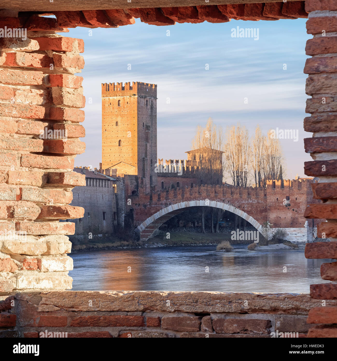 Old Verona town, view through brickwall window Stock Photo - Alamy