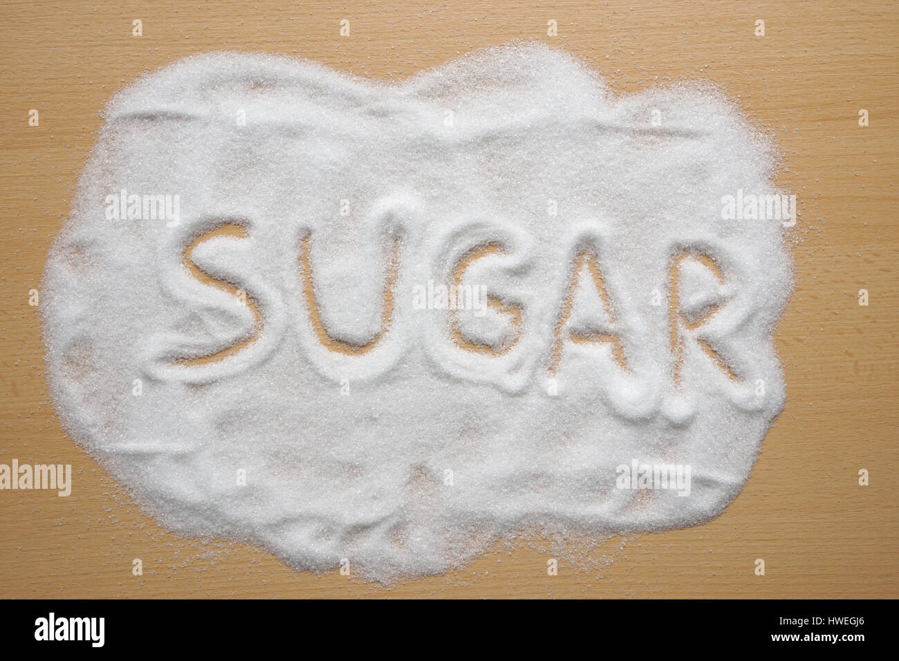 word sugar written in sugar Stock Photo - Alamy