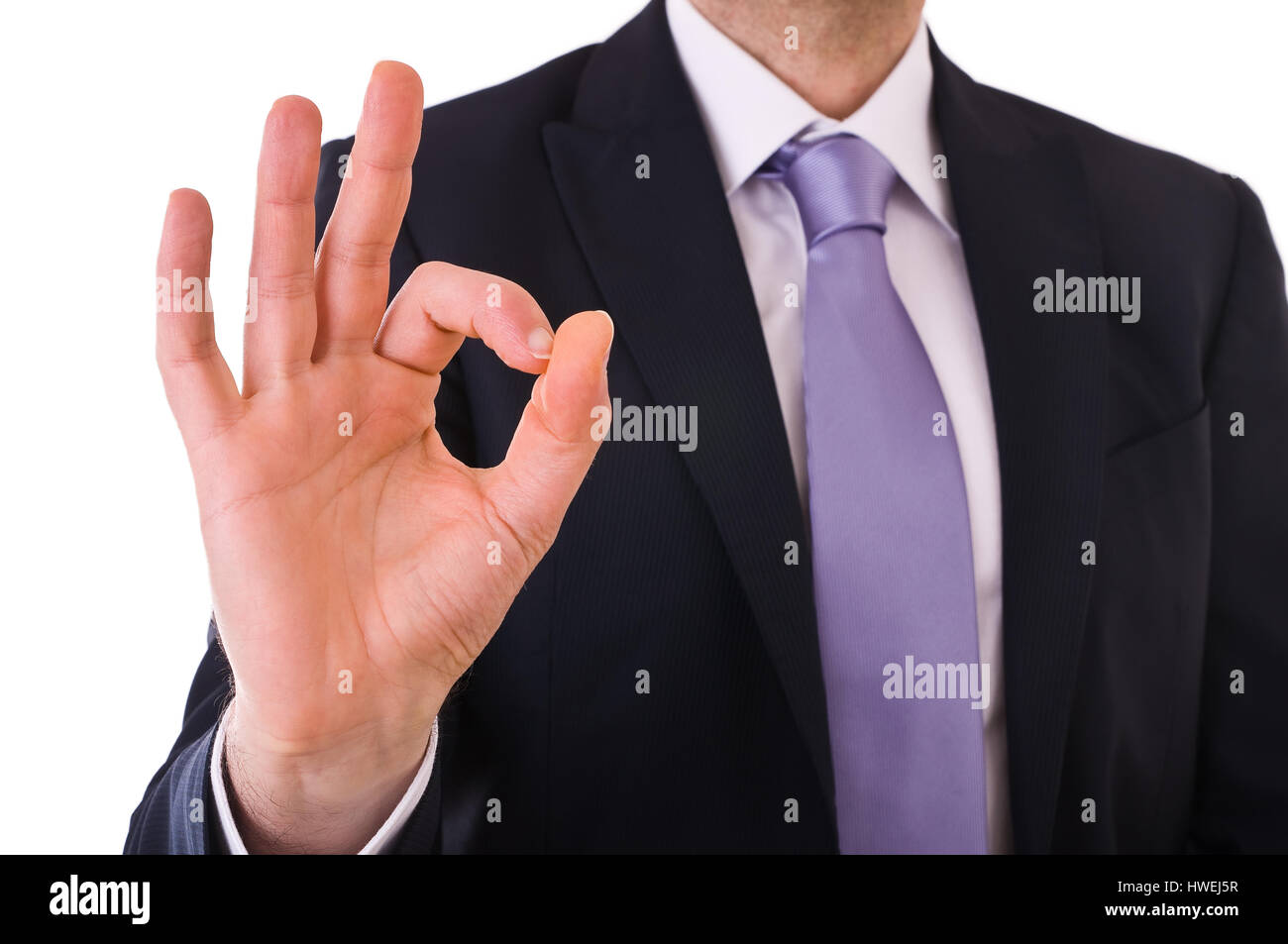 Business man showing ok sign Stock Photo - Alamy