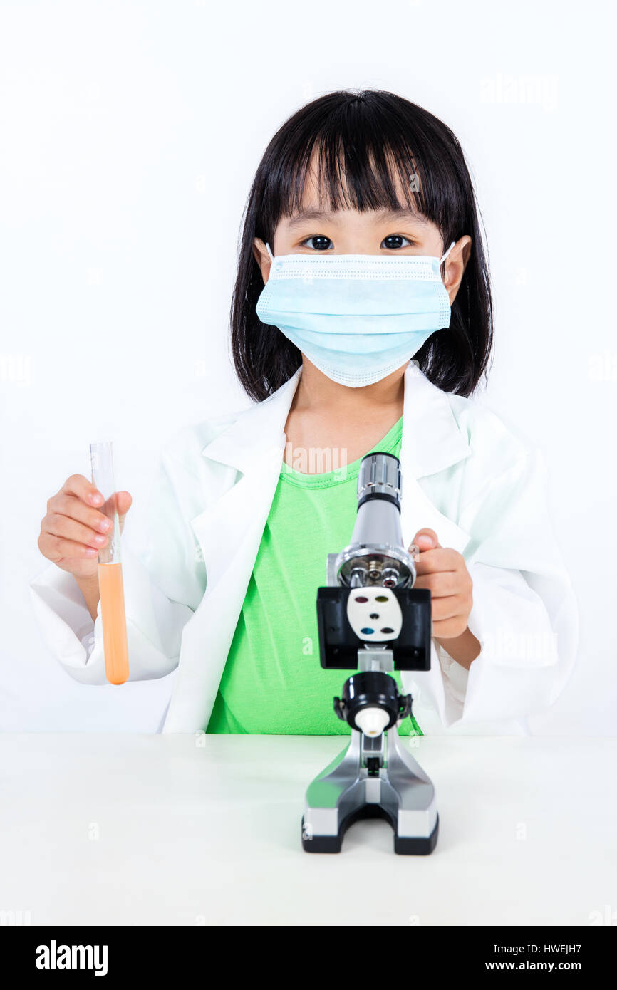 Asian Chinese Little Girl Examining Test Tube With Uniform in isolated ...