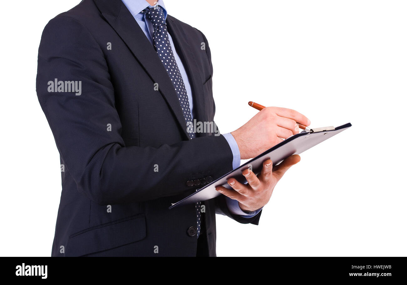 Businessman writing notes on clipboard Stock Photo - Alamy