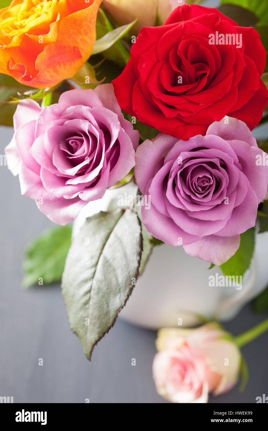 beautiful colorful rose flowers bouquet in vase Stock Photo - Alamy
