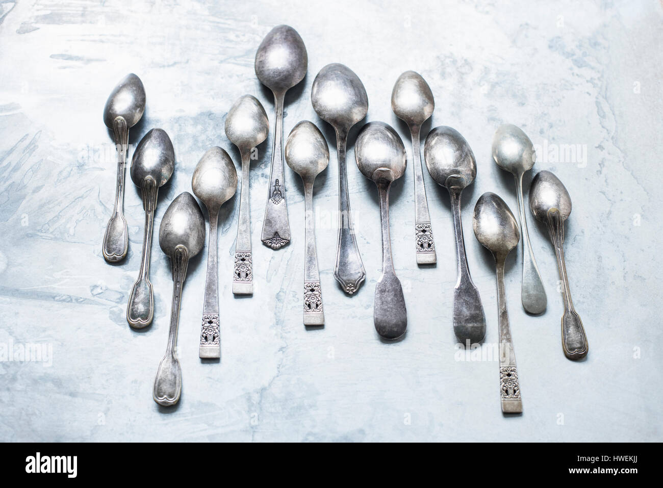 Studio shot, overhead view of teaspoons in staggered row Stock Photo ...