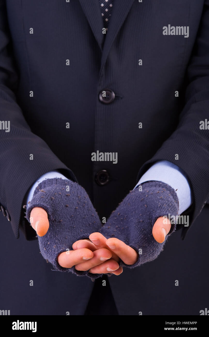 Businessman begging for money Stock Photo - Alamy