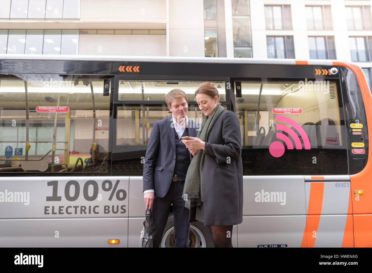 Bus passengers standing hi-res stock photography and images - Alamy