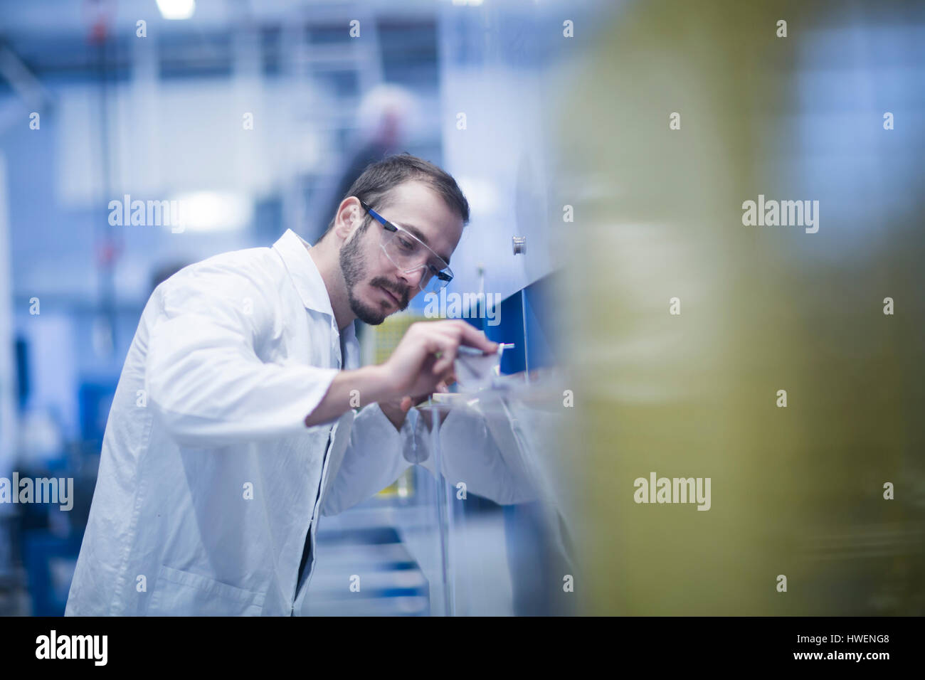 Scientist completing analysis Stock Photo - Alamy
