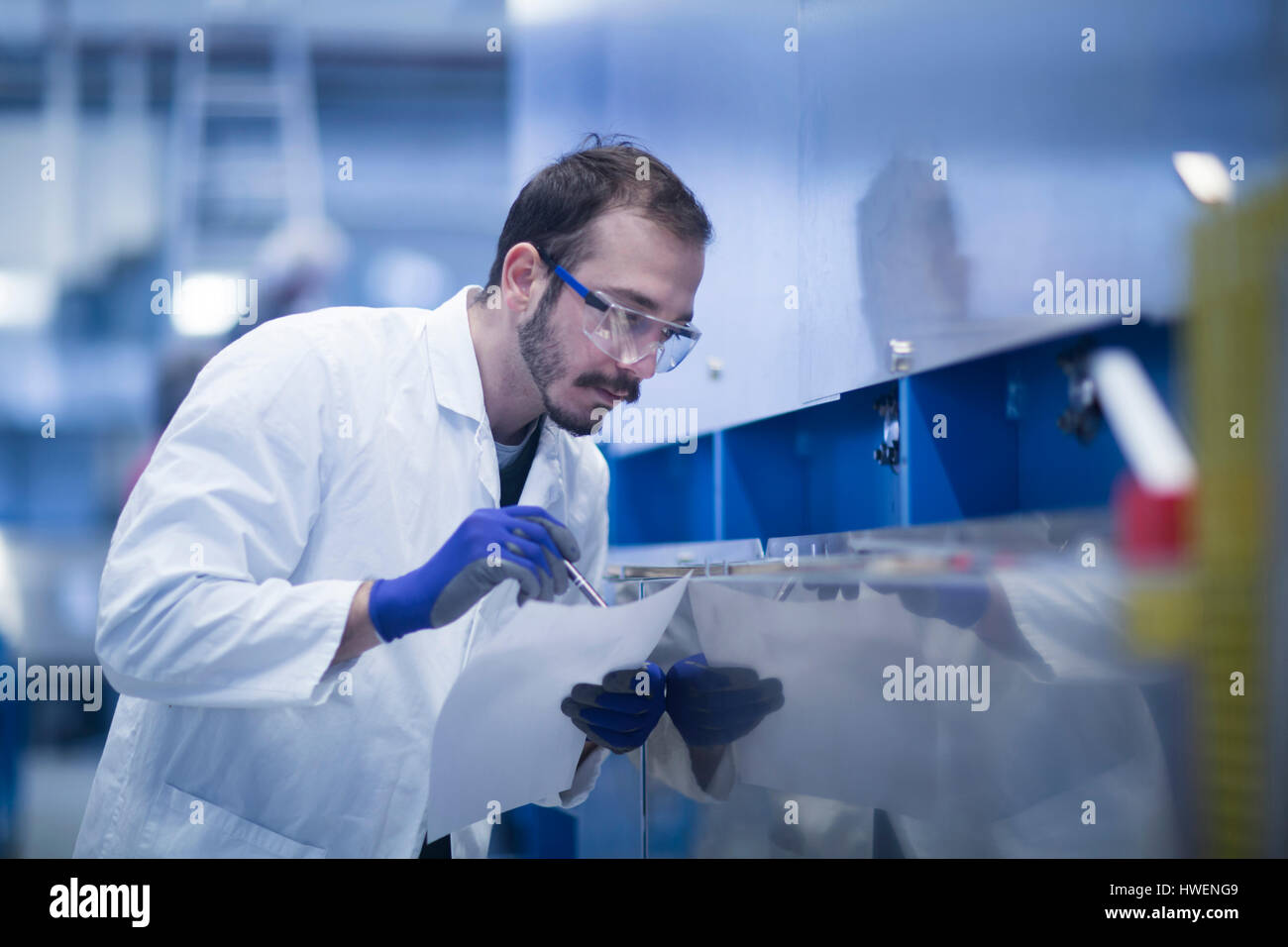 Completing paperwork hi-res stock photography and images - Alamy