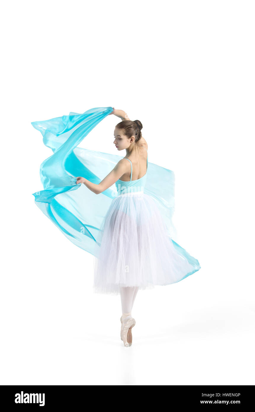 Young, smiling woman dancing the ballet. Studio shot of ballet on a ...
