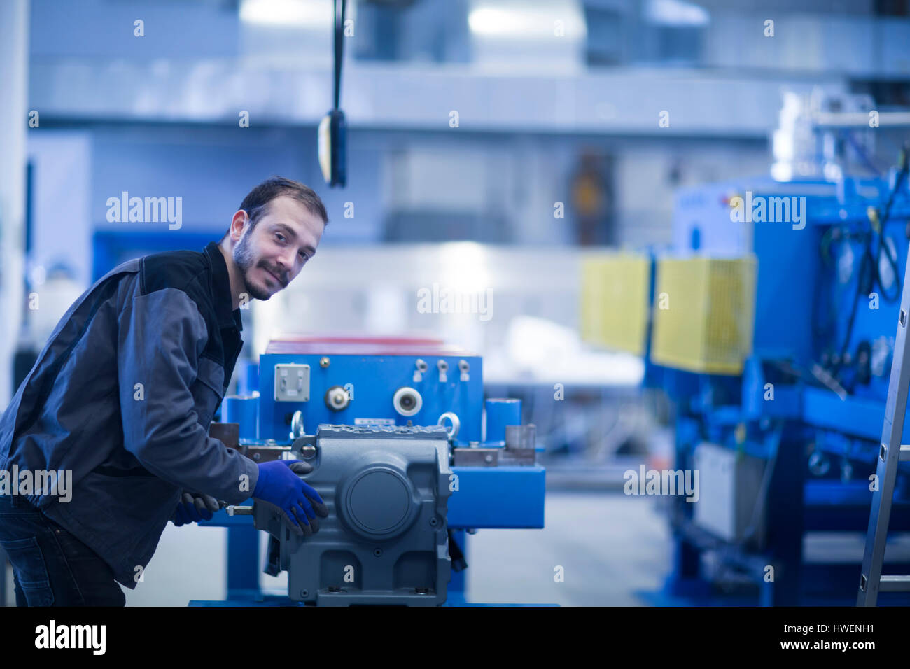 Engineer operating heavy machinery Stock Photo - Alamy