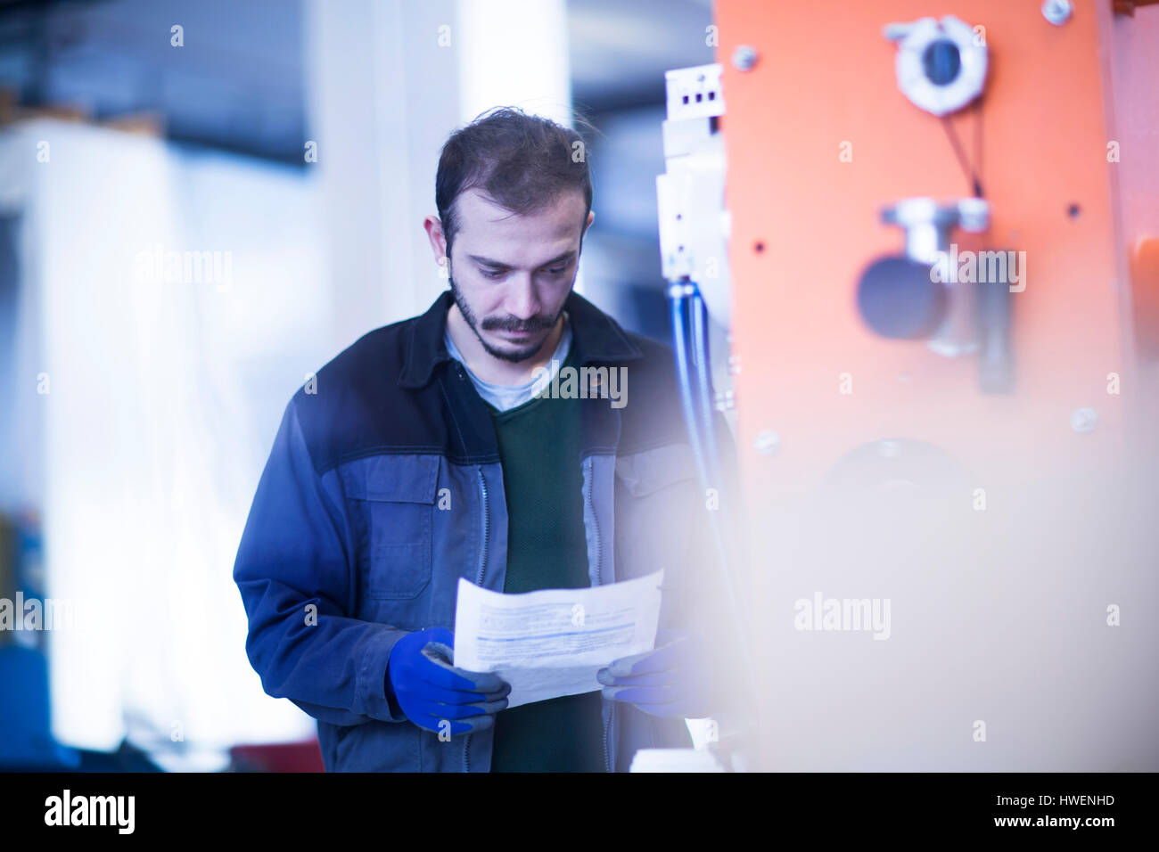 Young mechanical engineer holding hi-res stock photography and images ...
