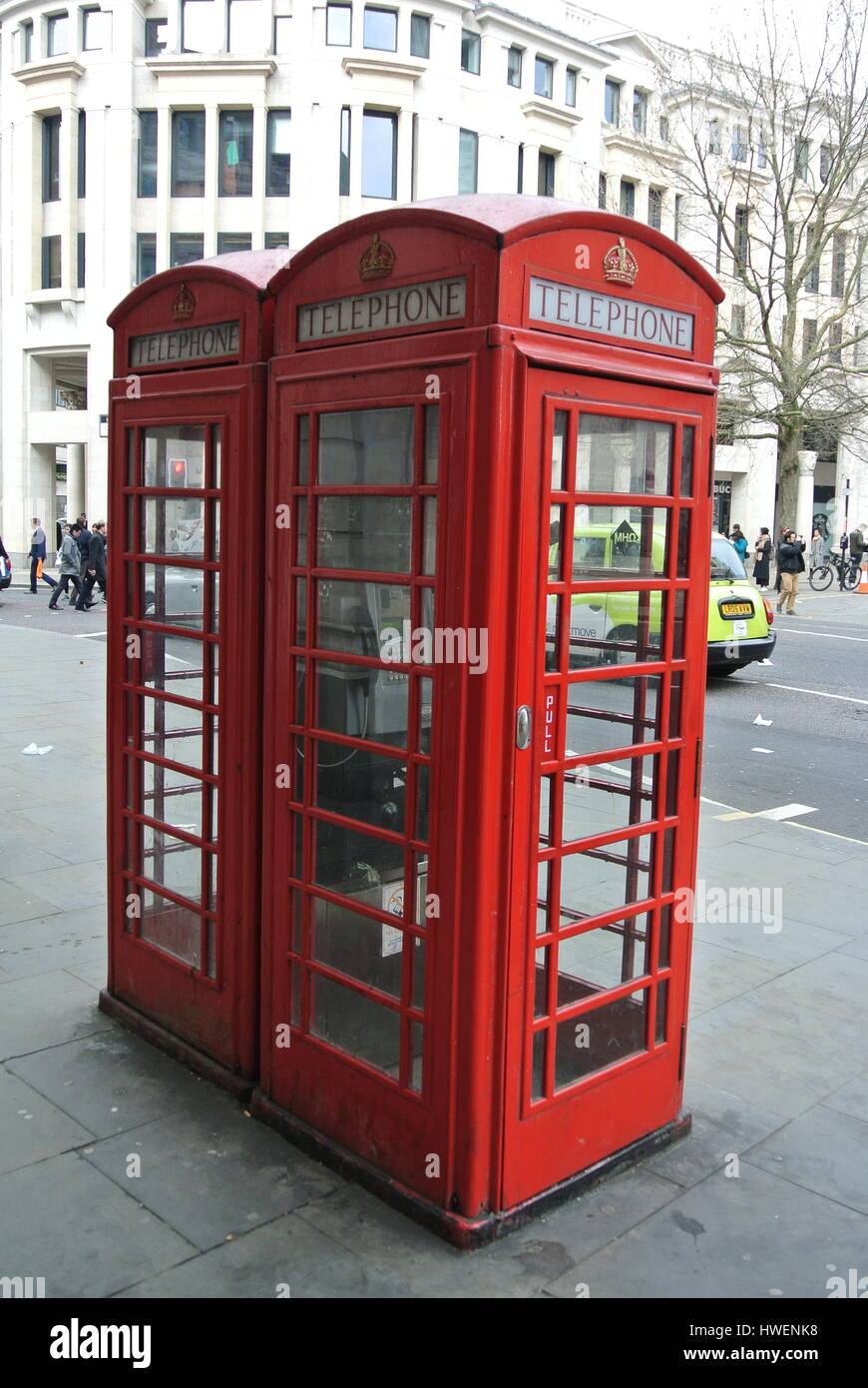 pair of traditional British Telecom red telephone boxes, London ...