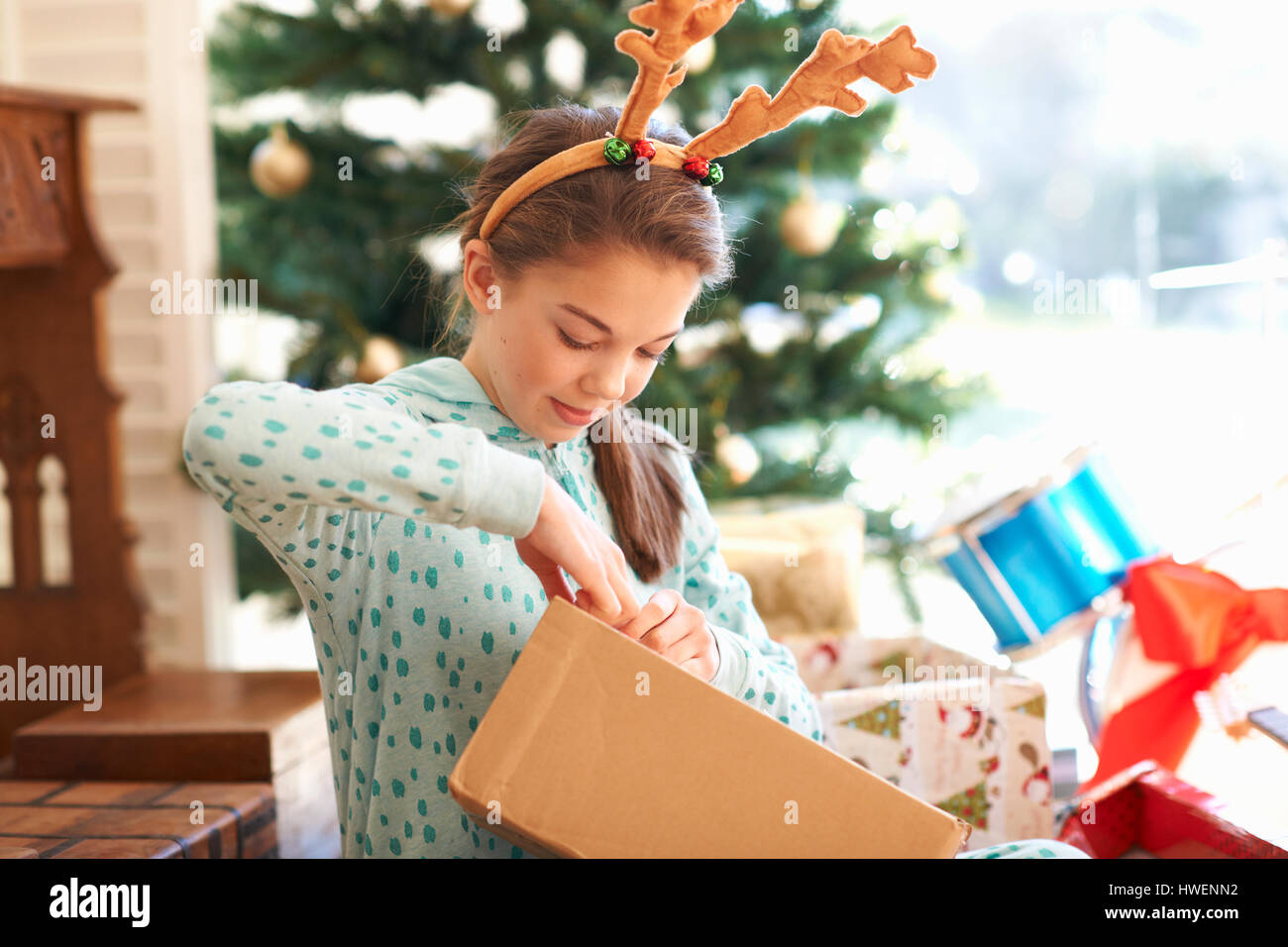 Girl opening present hi-res stock photography and images - Alamy