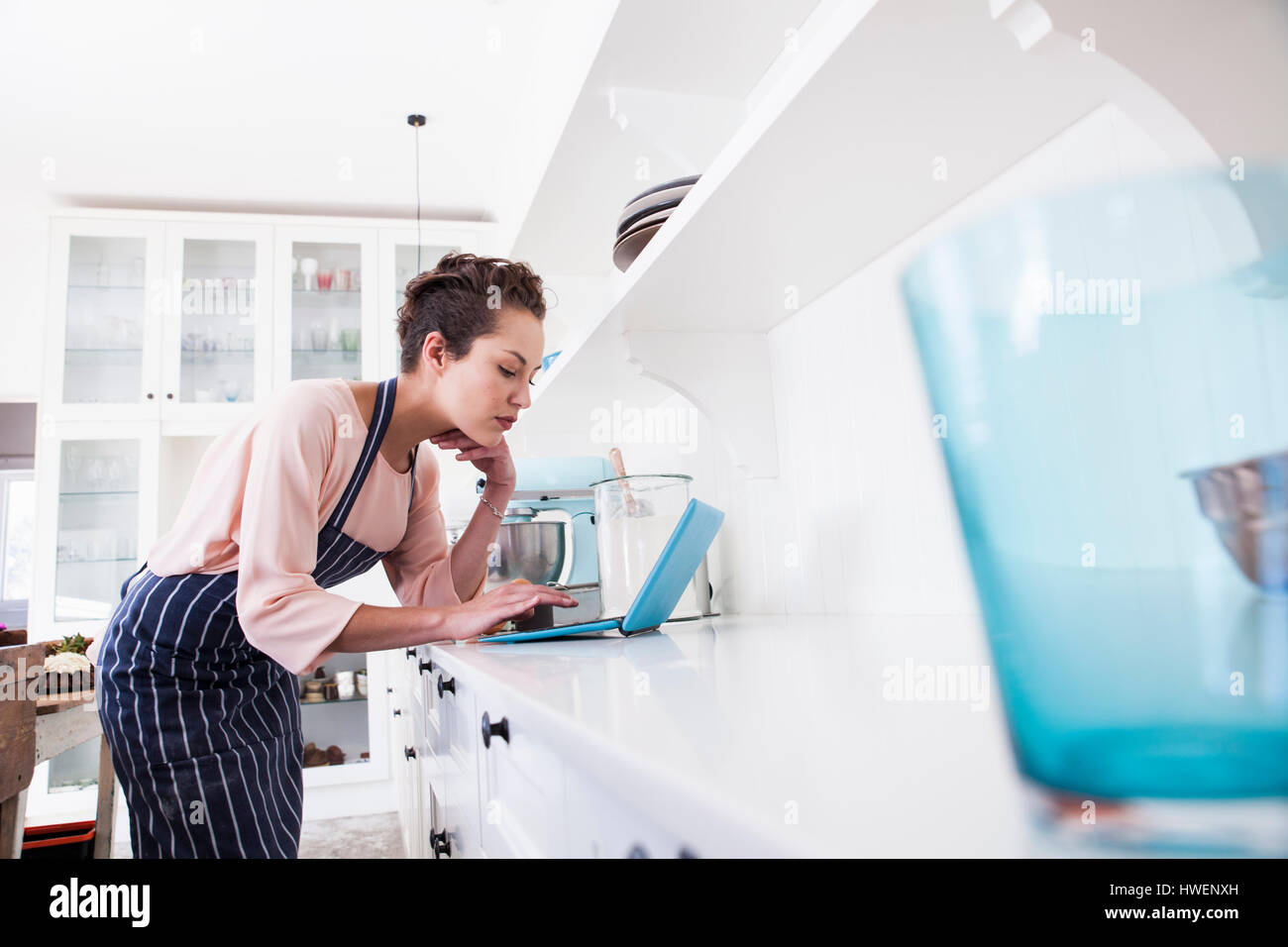 Lady Leaning On Counetr