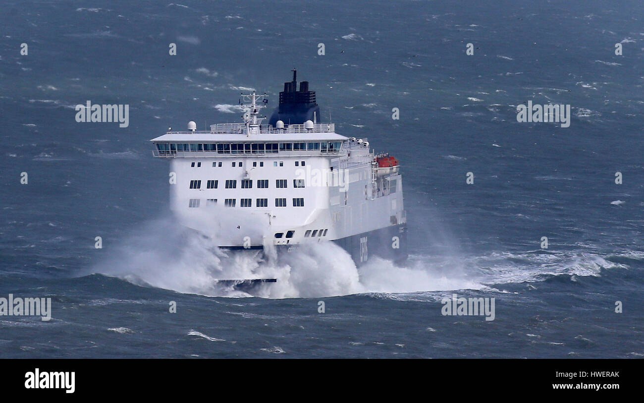 A DFDS Ferry arrives in windy conditions at the Port of Dover in Kent ...