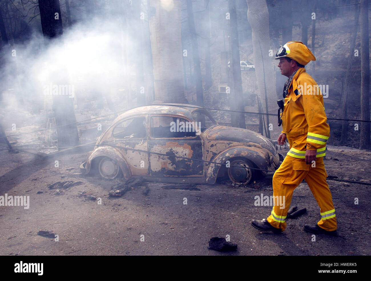 CEDAR GLEN ,CA , UNITED STATES : Firefighter Robert Trapp looks over ...