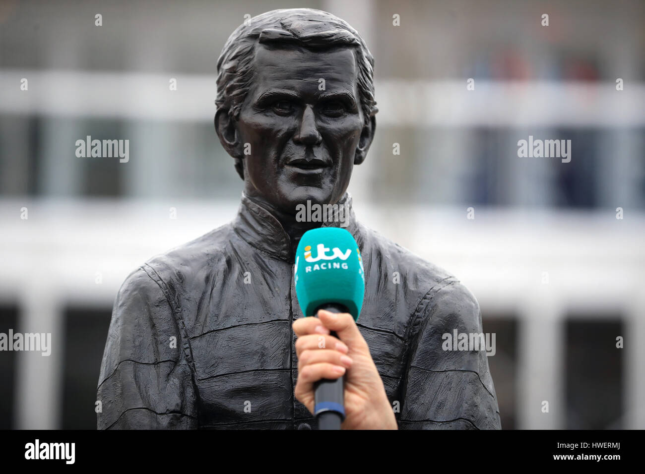 The newly unveiled AP McCoy statue with an ITV Racing microphone Stock ...