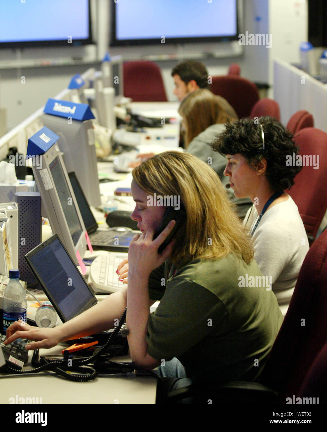 Members of NASA's Jet Propulsion Laboratory monitor the Mars's rover ...