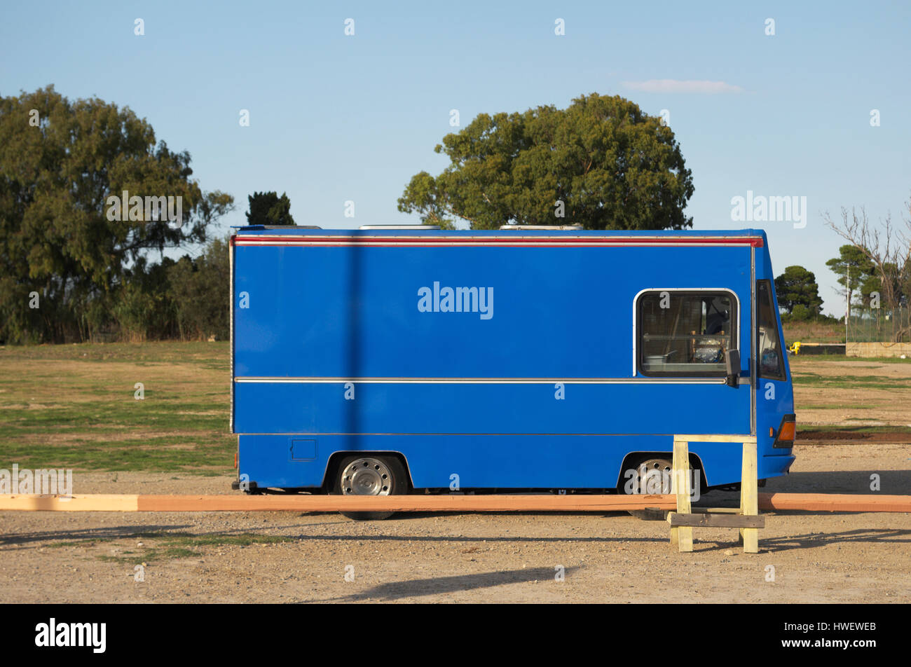 blue van in parking lot Stock Photo - Alamy