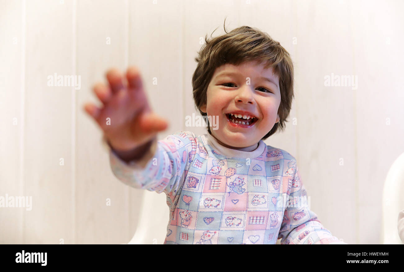 kid smiling and have fun white background Stock Photo - Alamy