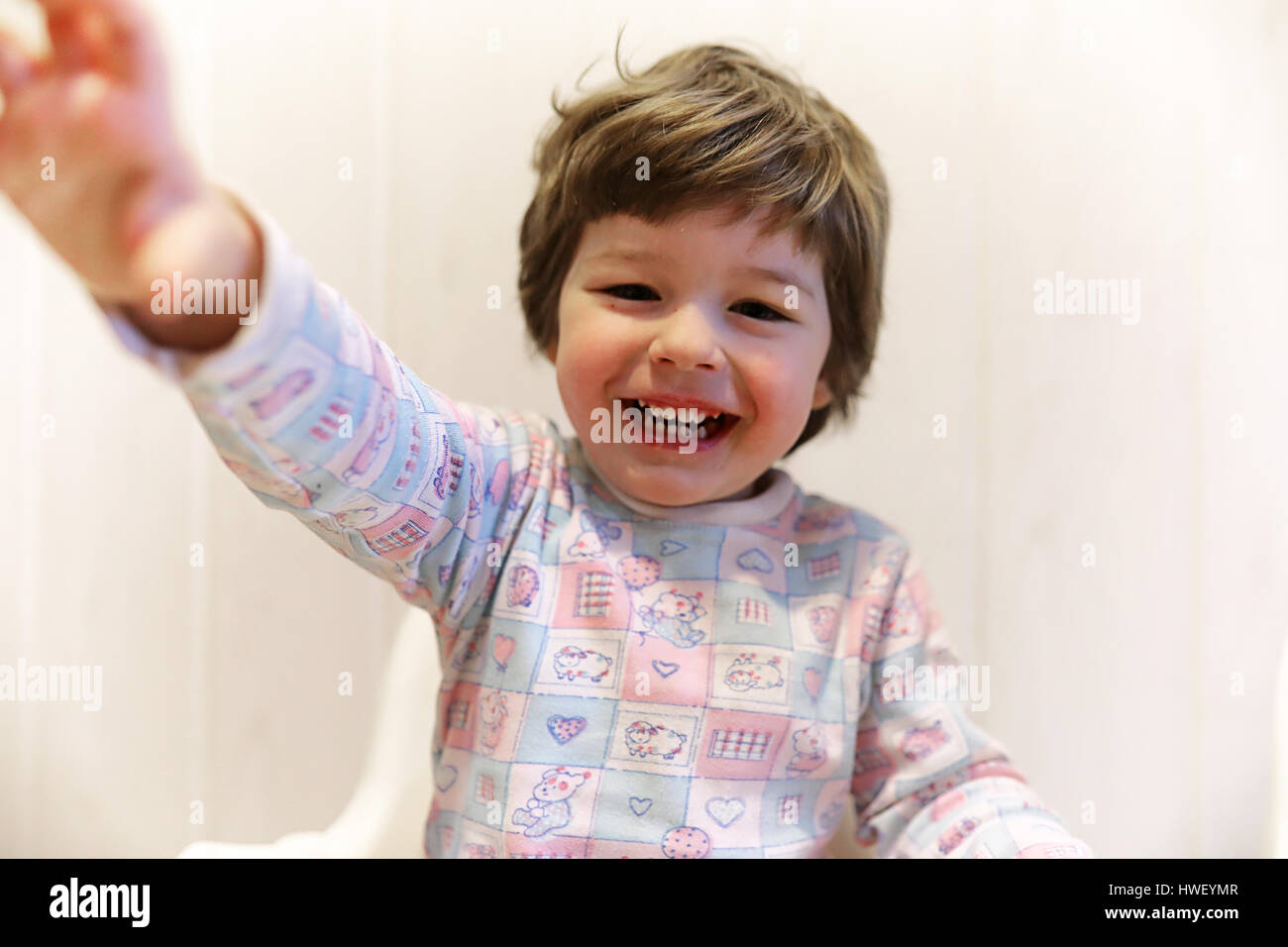 kid smiling and have fun white background Stock Photo - Alamy